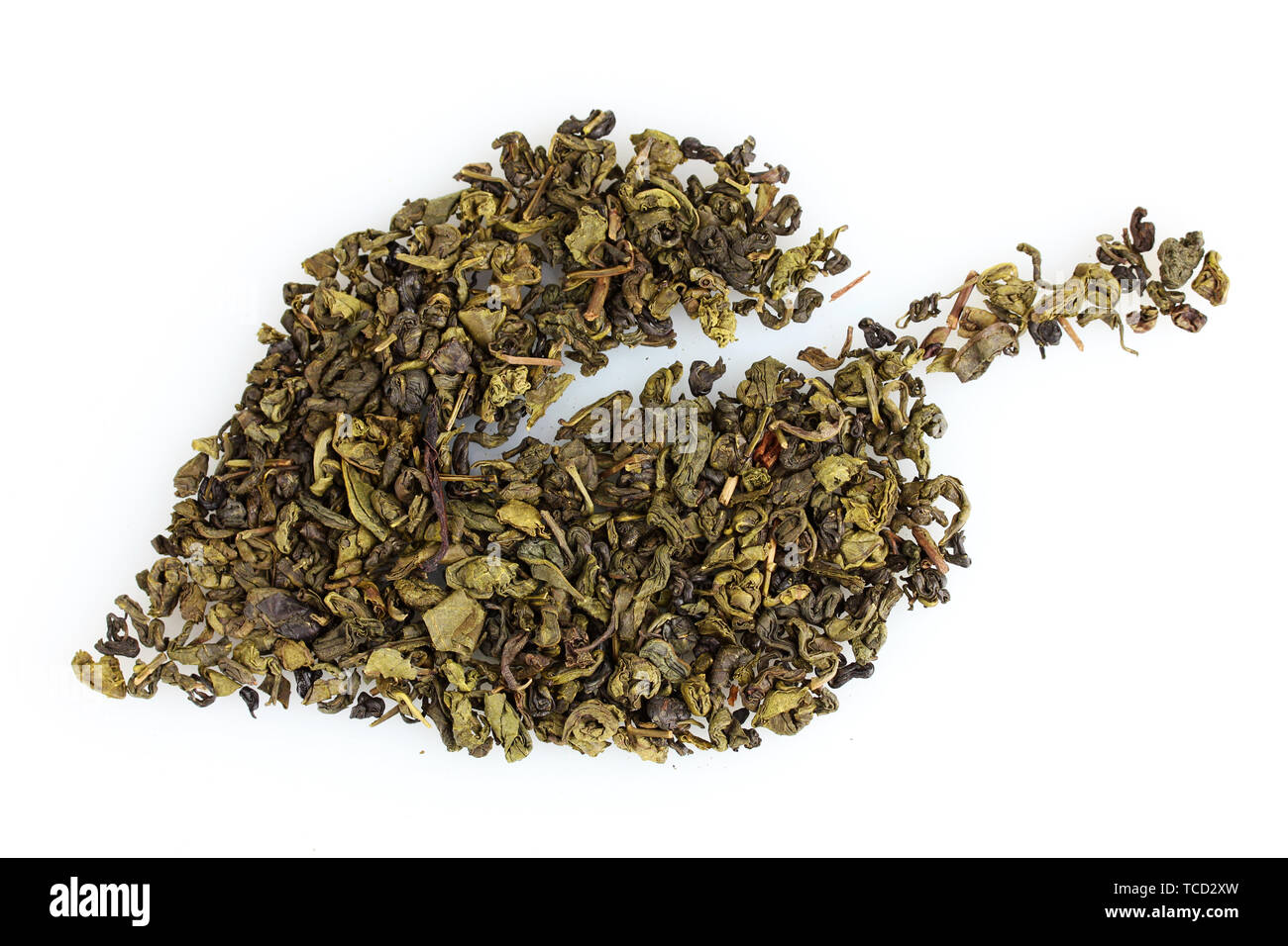 green dry tea leaf shape isolated on white Stock Photo - Alamy