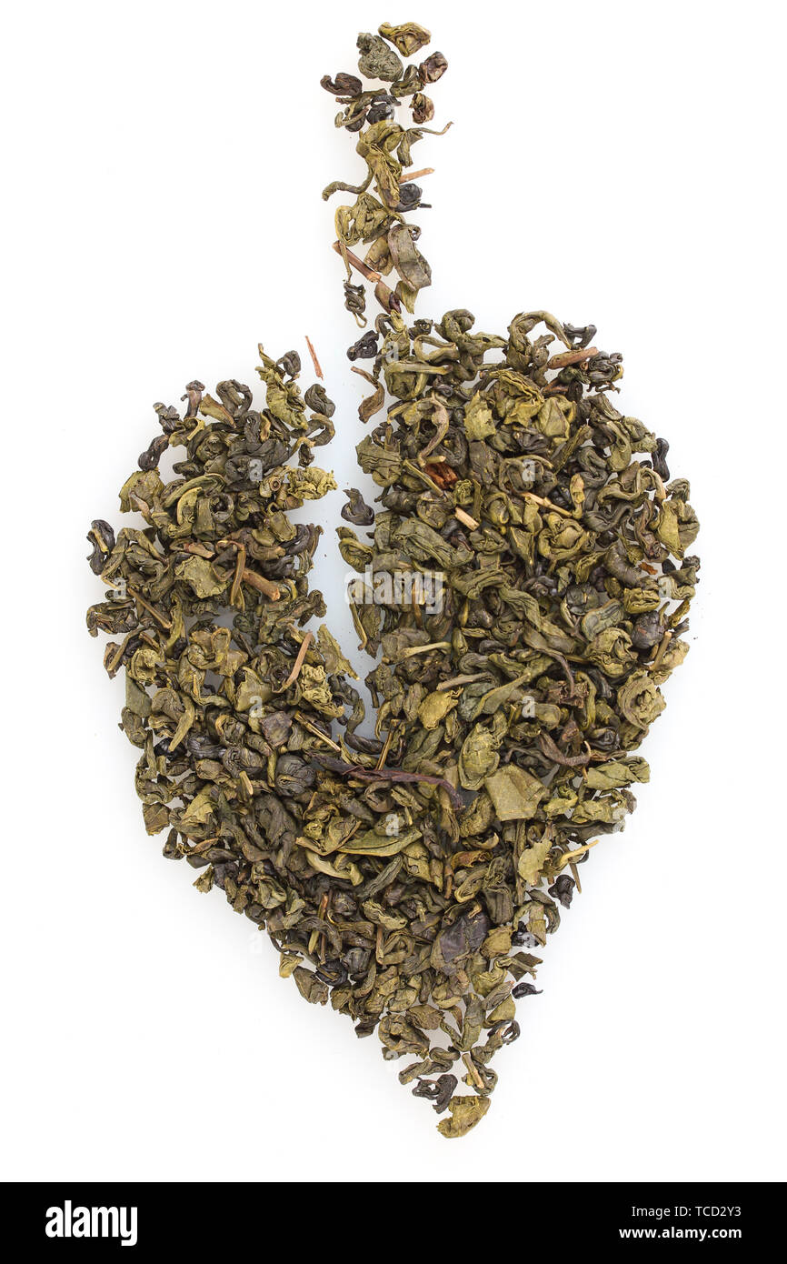 green dry tea leaf shape isolated on white Stock Photo - Alamy