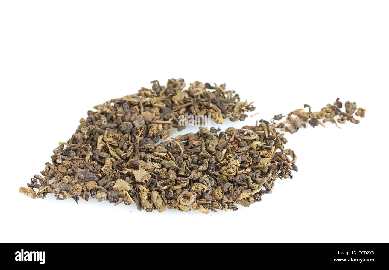 green dry tea leaf shape isolated on white Stock Photo - Alamy