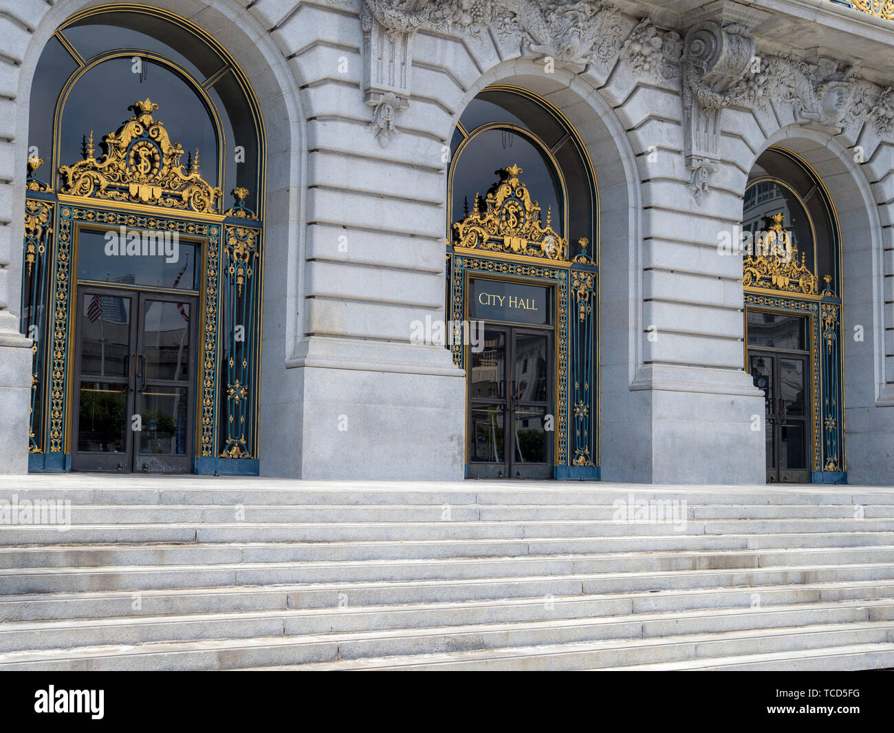 Outdoor staircase leading to entrance to classical city hall building ...
