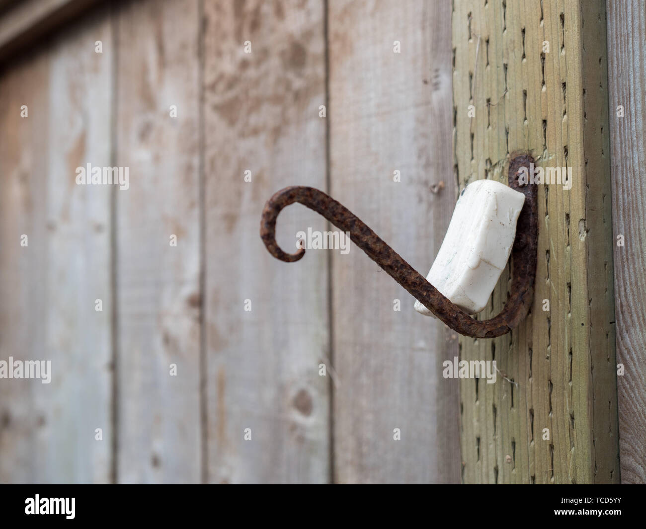Rusty hook with bar of soap resting in an outdoor fence area Stock ...