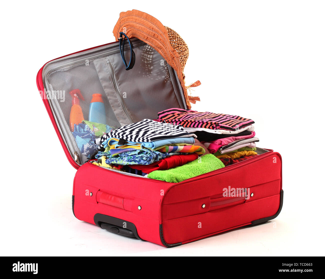 Open red suitcase with clothing isolated on white Stock Photo - Alamy