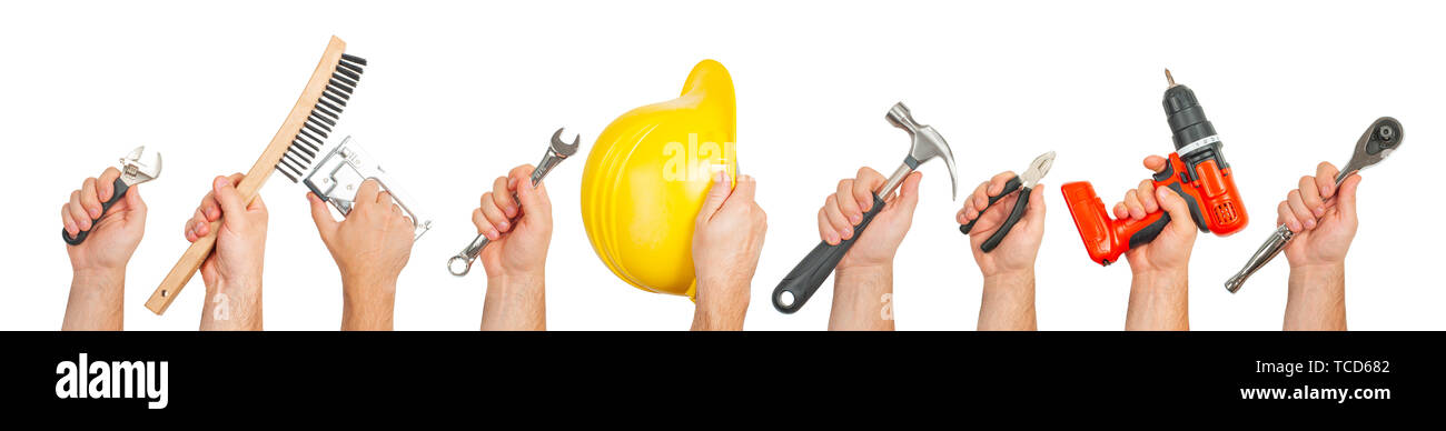 Hand tools. Hands holding construction tools isolated on white ...