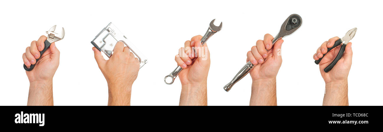 Hand tools. Hands holding industry tools isolated on white background ...