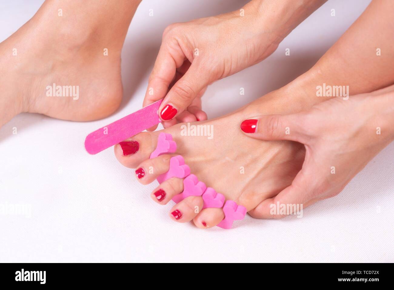 Red toenail polish hi-res stock photography and images - Alamy