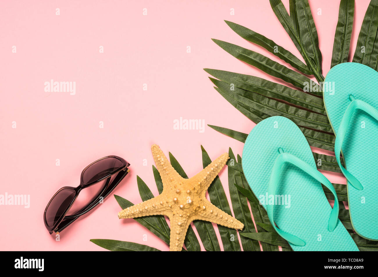 Summer flat lay background on pink Stock Photo - Alamy