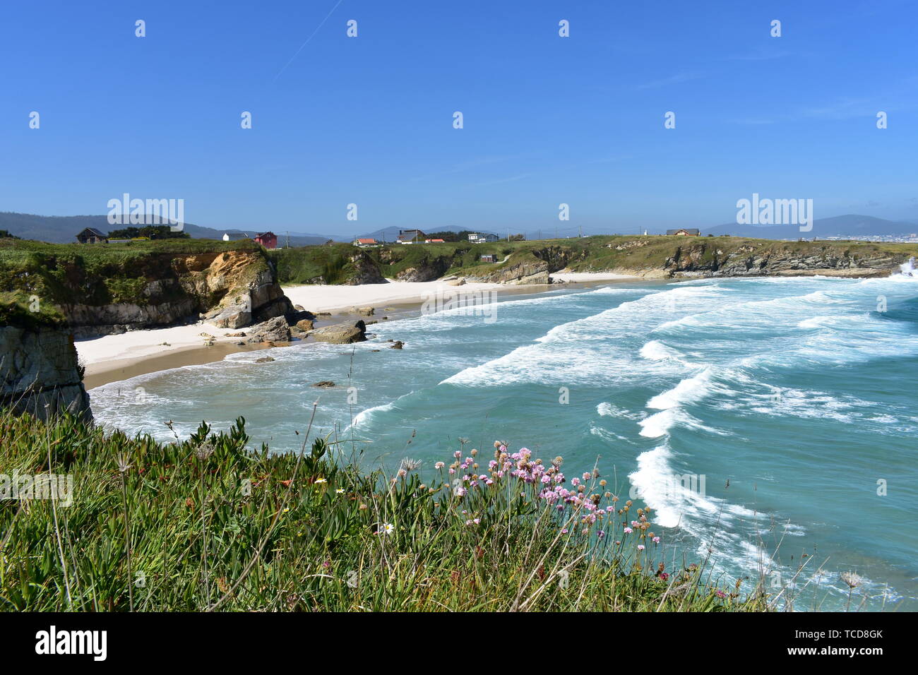 Beach with white sand, rocks and waves. View from a cliff, Lugo, Spain ...