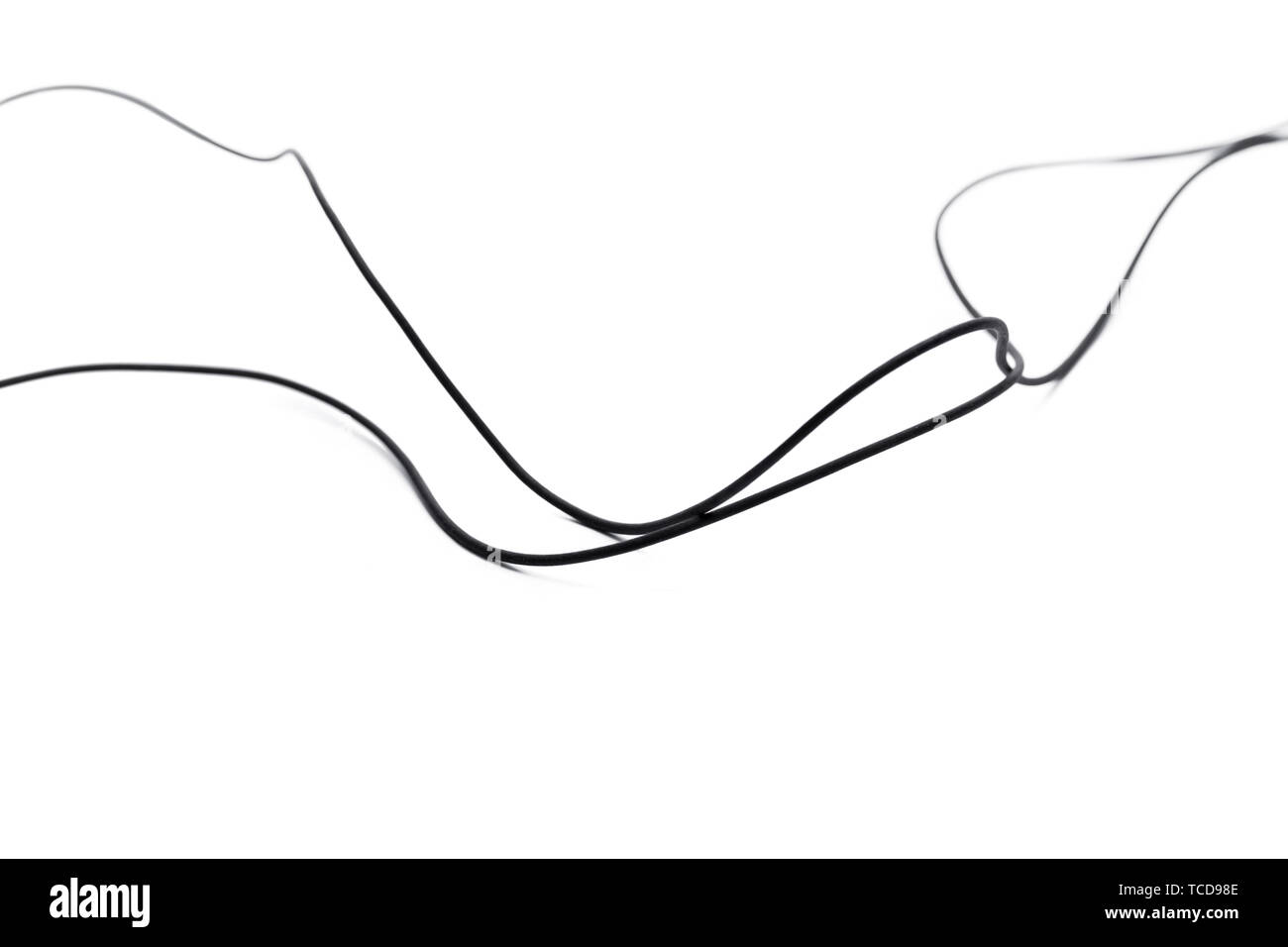 black wire isolated on a white background Stock Photo - Alamy