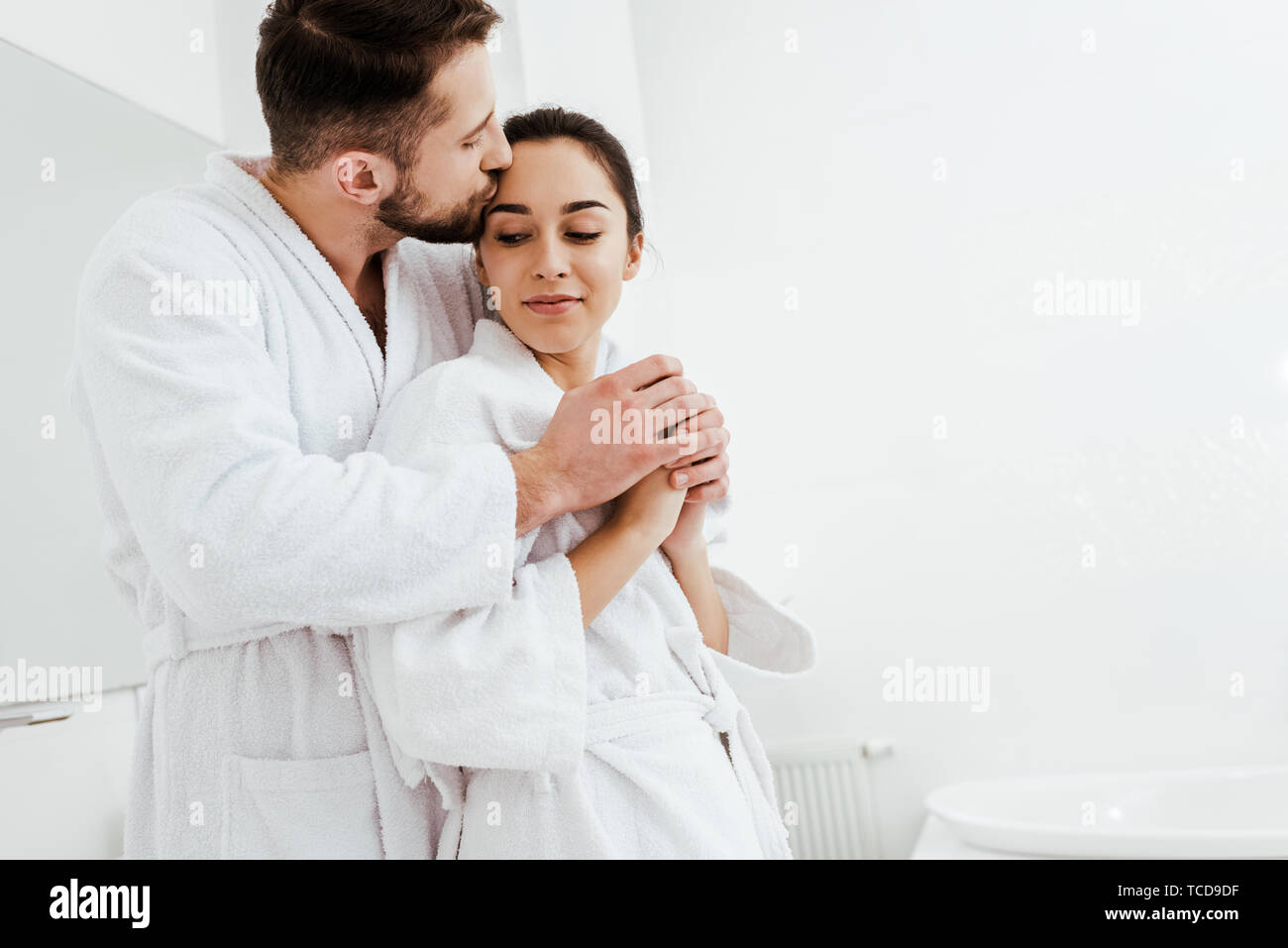 Couple kissing in bathroom hi-res stock photography and images - Alamy