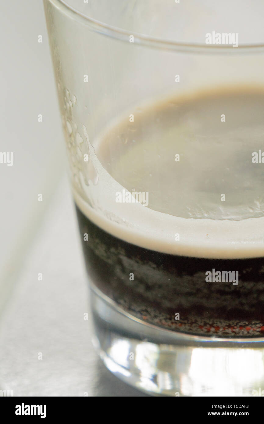 Dark beer in glass hi-res stock photography and images - Alamy