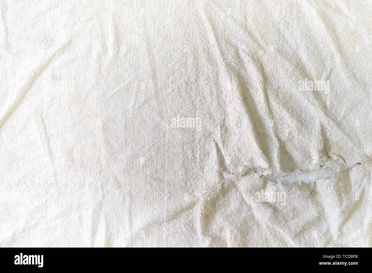 teared rag spread out to flat on the floor, can use like a background ...