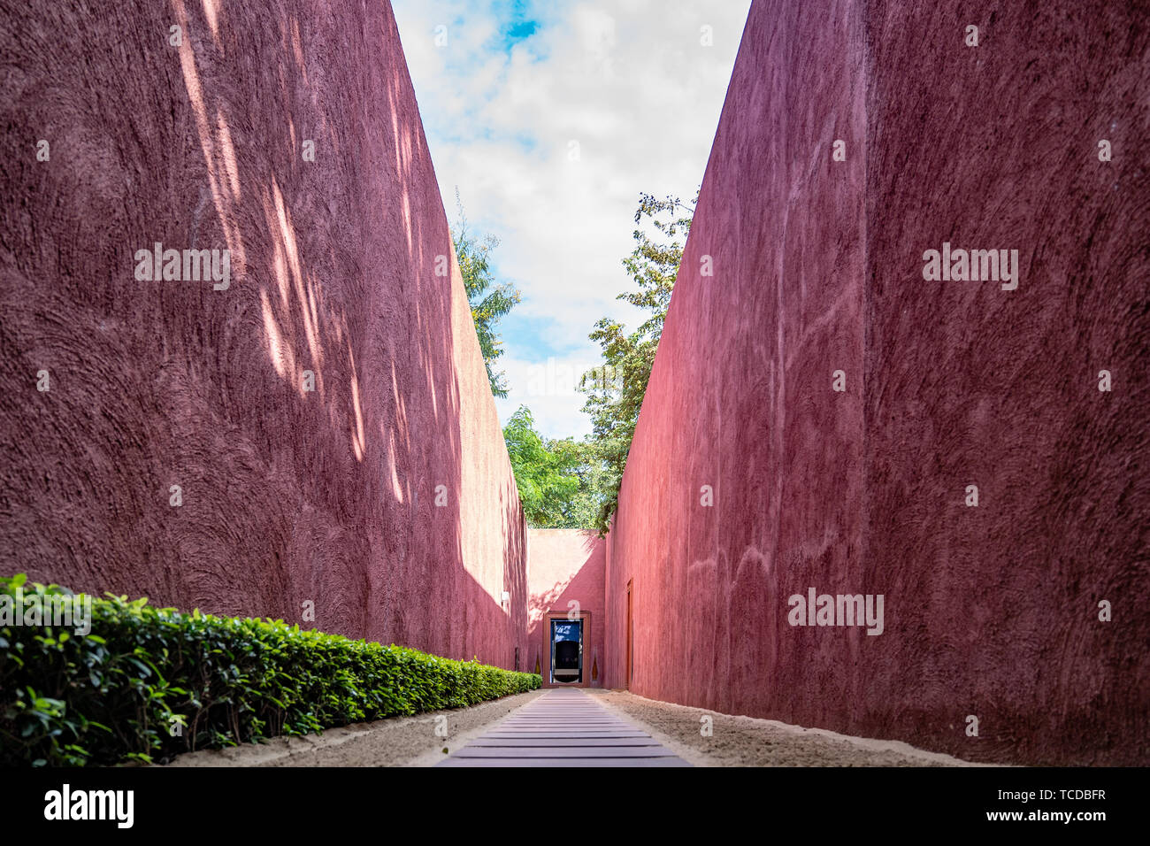 beautiful red unique walkway wall with abstract texture all around ...