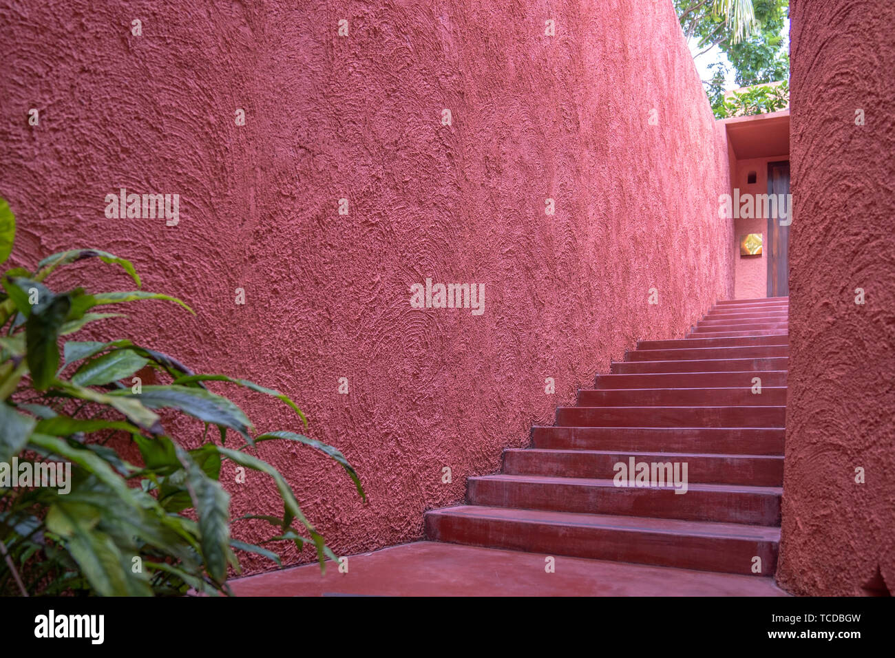 beautiful red unique walkway wall with abstract texture all around ...