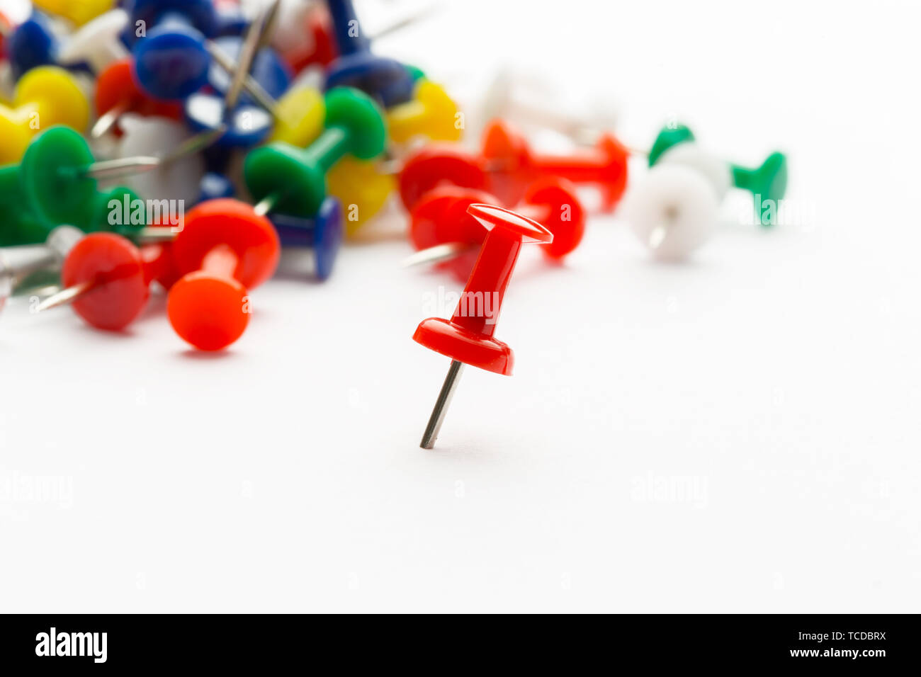 Push pins isolated on white background Stock Photo - Alamy
