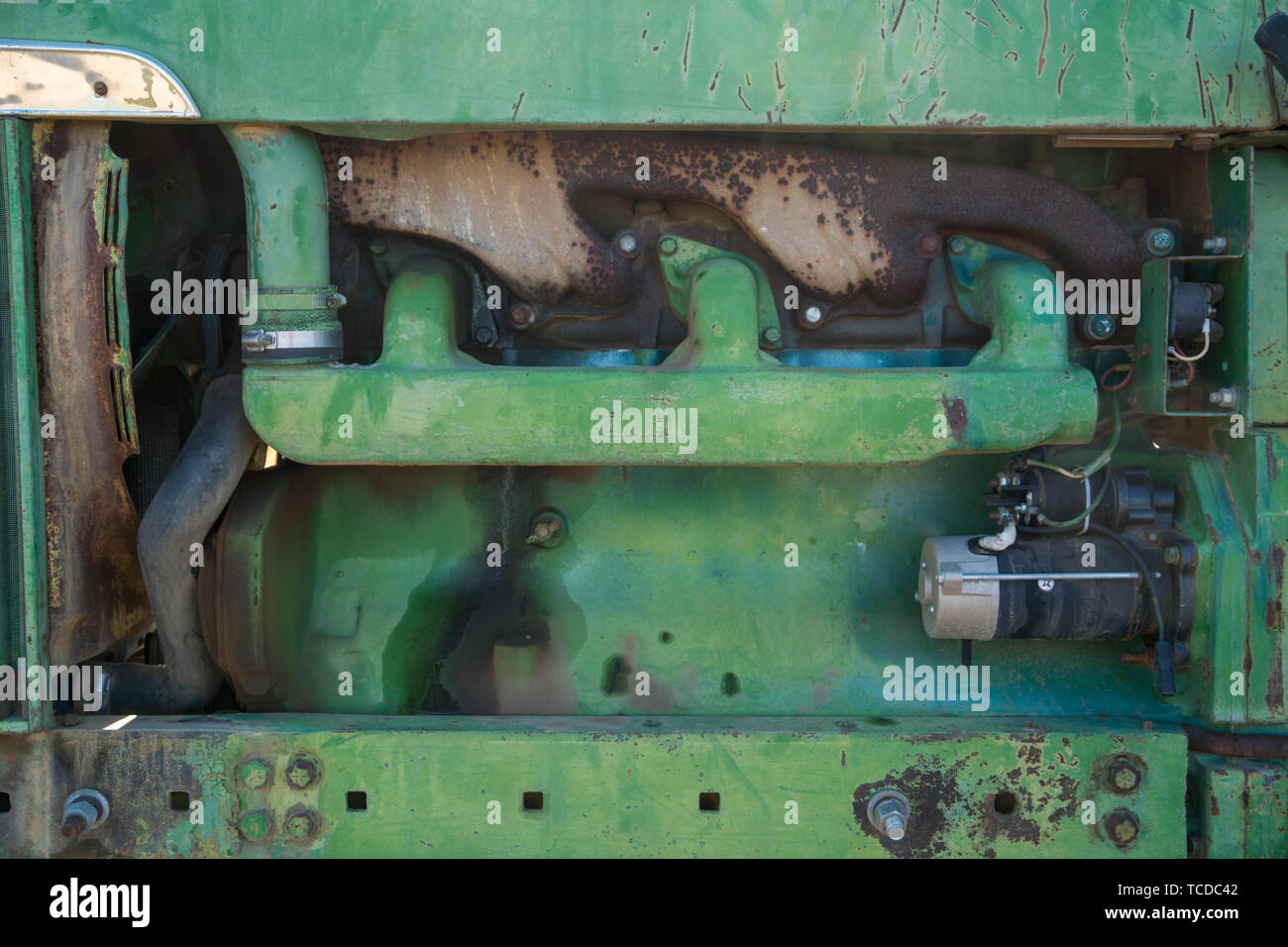 Green agriculture tractor diesel engine Stock Photo - Alamy