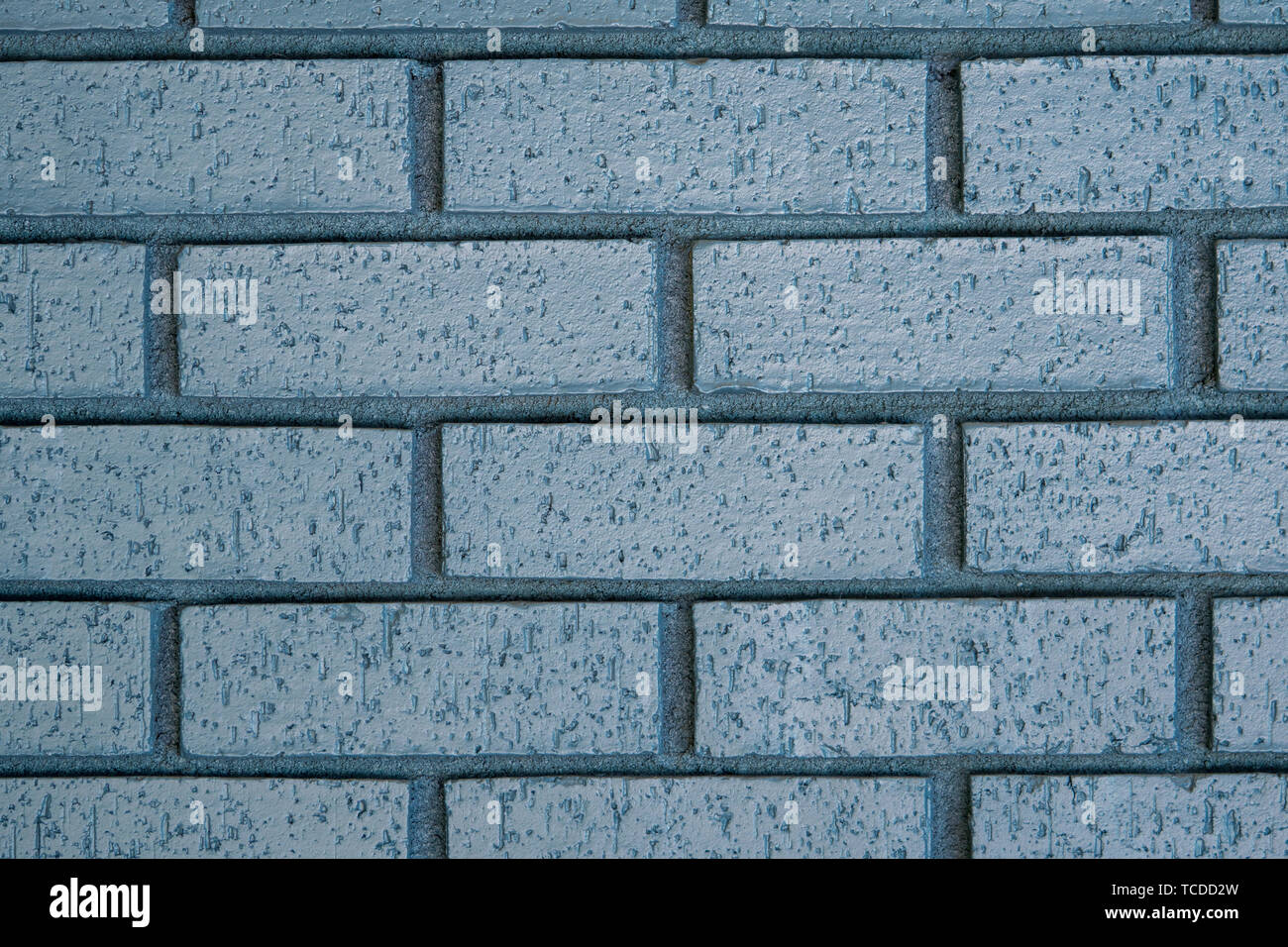 Blue outdoor painted brick wall Stock Photo - Alamy