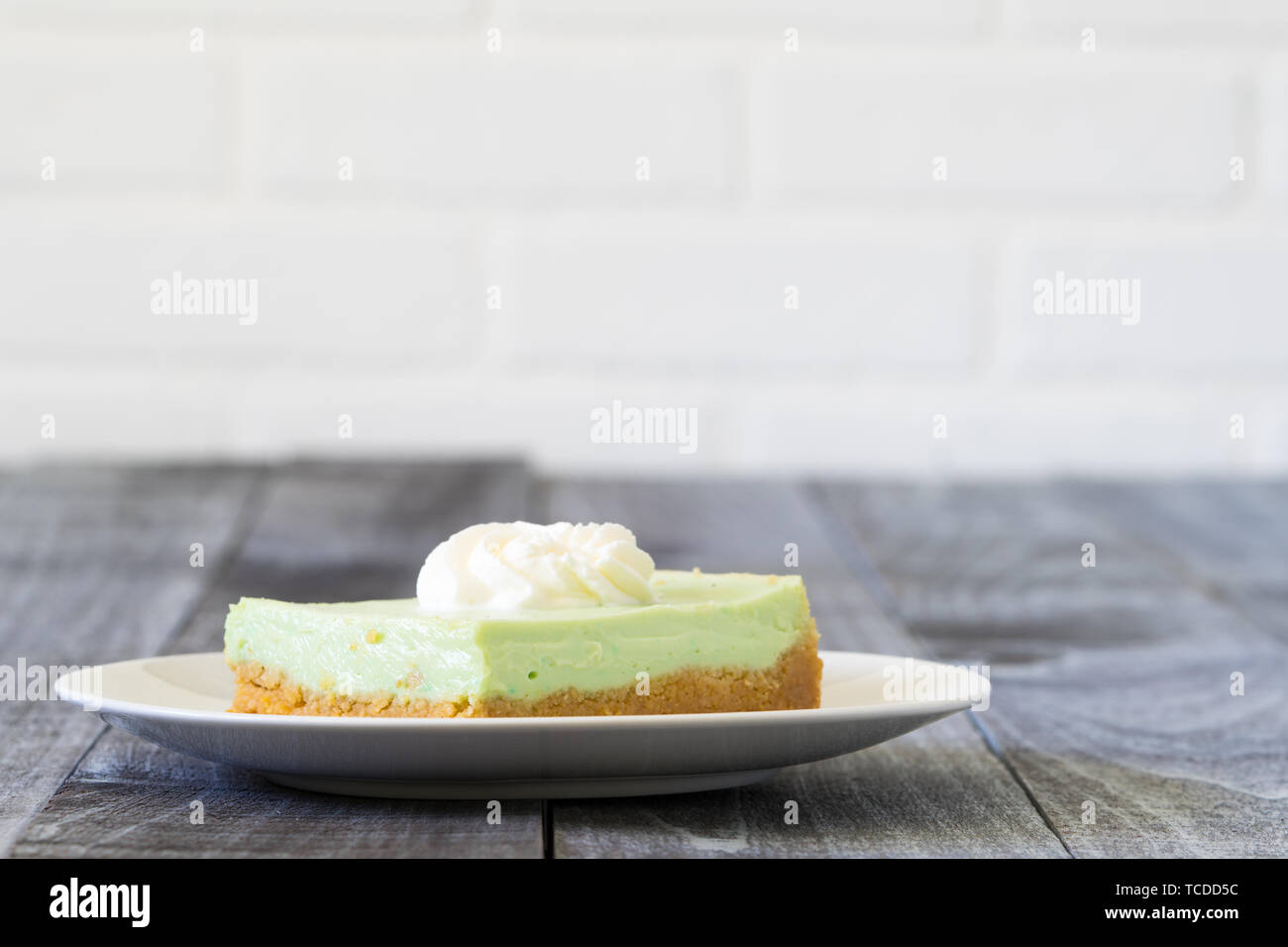 Key lime pie square slice Stock Photo - Alamy