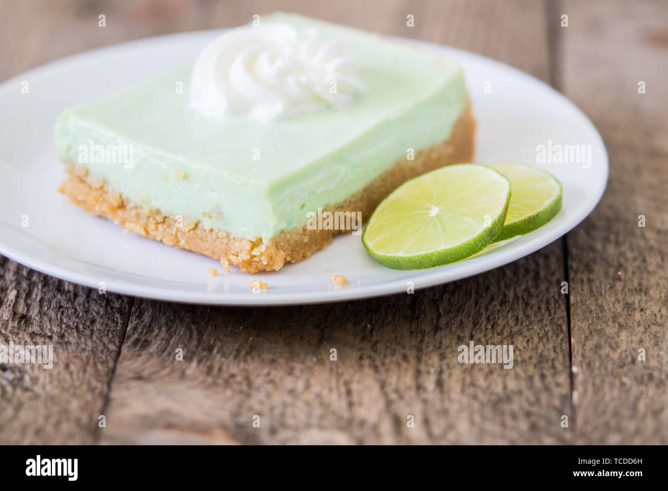 Key lime pie square slice Stock Photo - Alamy