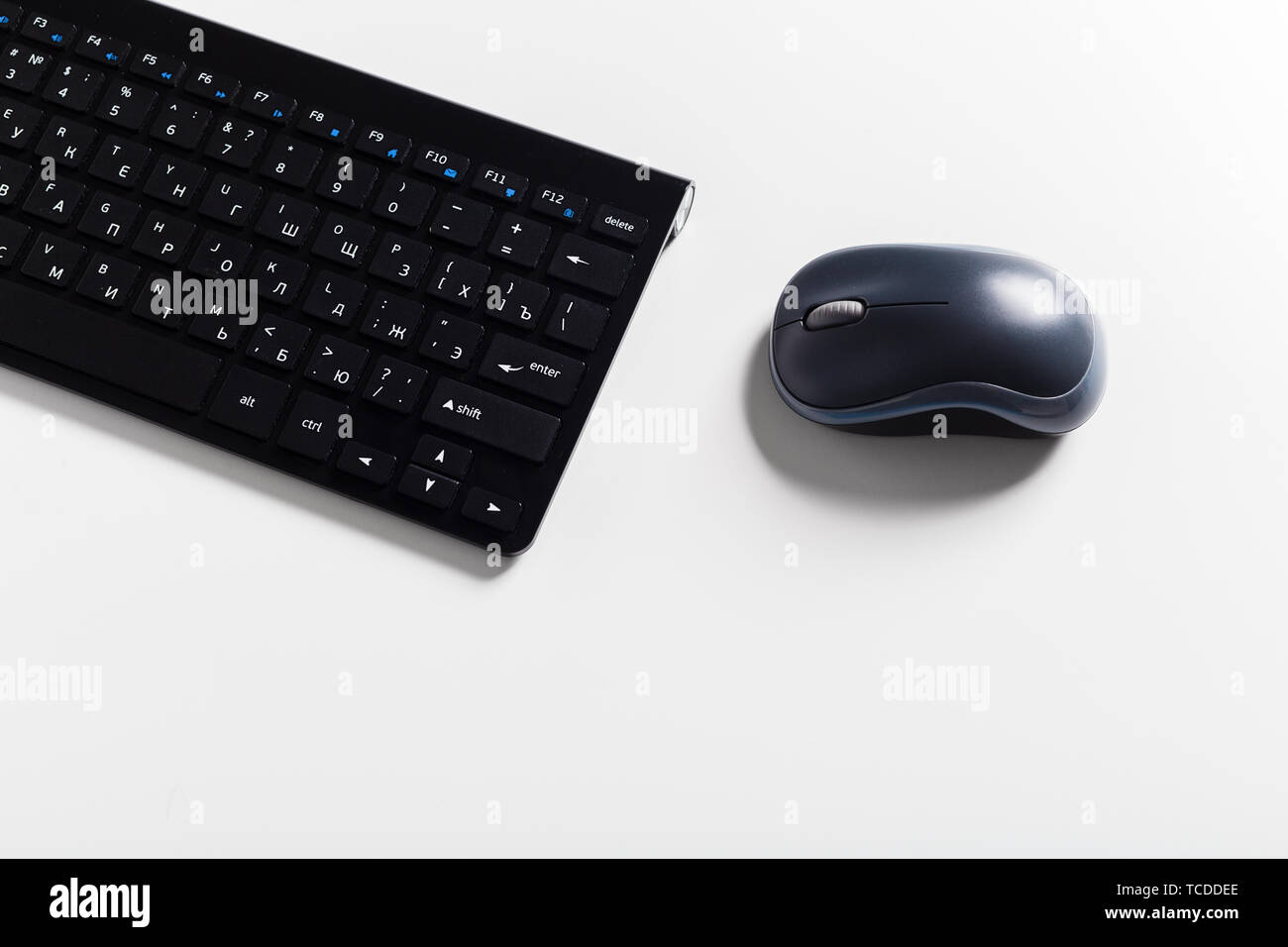 keyboard and mouse on the table Stock Photo - Alamy