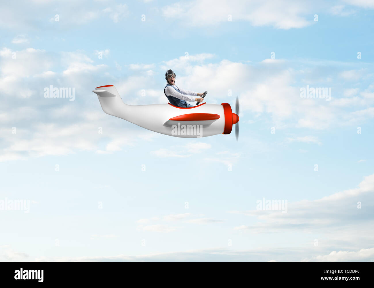 Happy pilot driving small propeller plane Stock Photo - Alamy