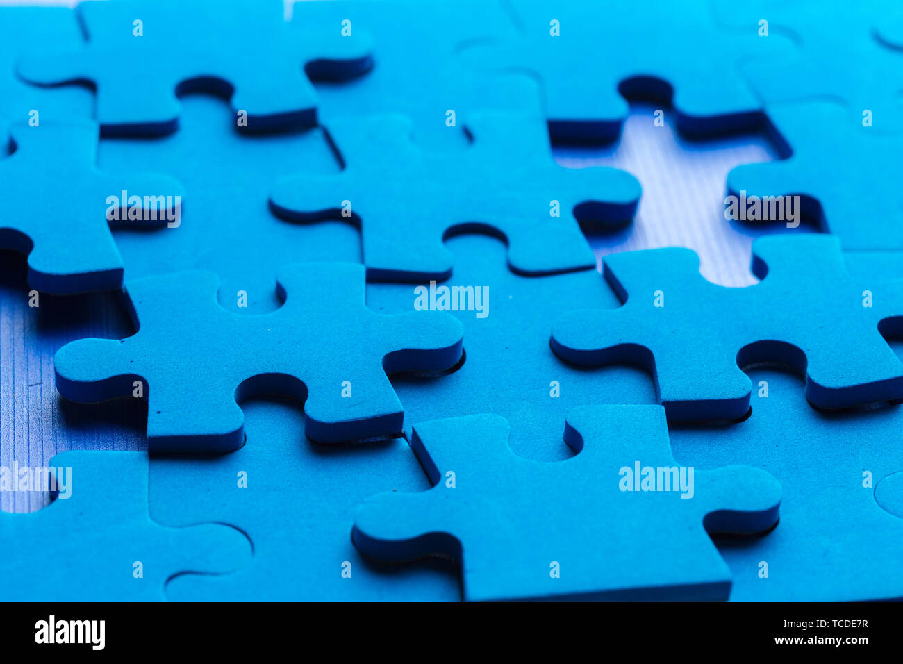 Incomplete puzzle with missing piece Stock Photo - Alamy