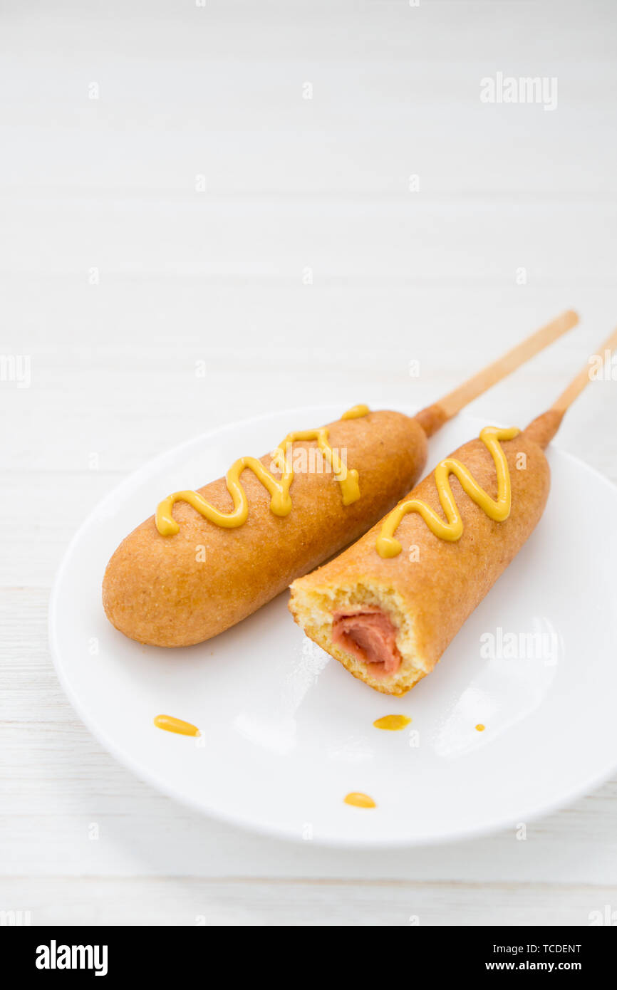 Two corn dogs mustard hi-res stock photography and images - Alamy