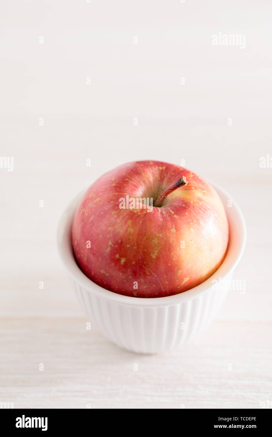 Red apple inside bowl hi-res stock photography and images - Alamy