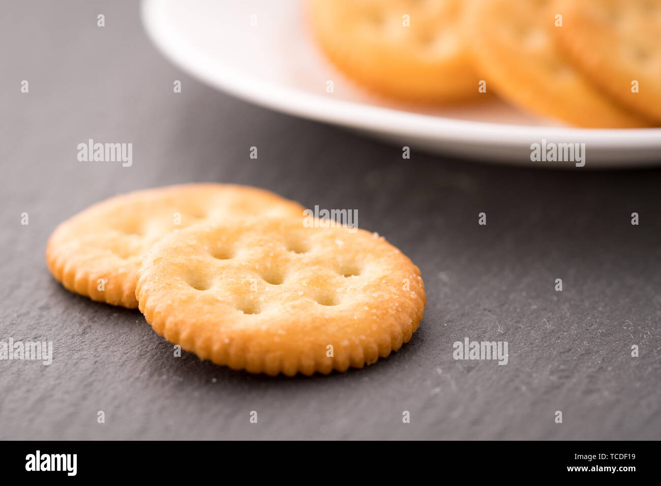 pile of round crackers Stock Photo - Alamy