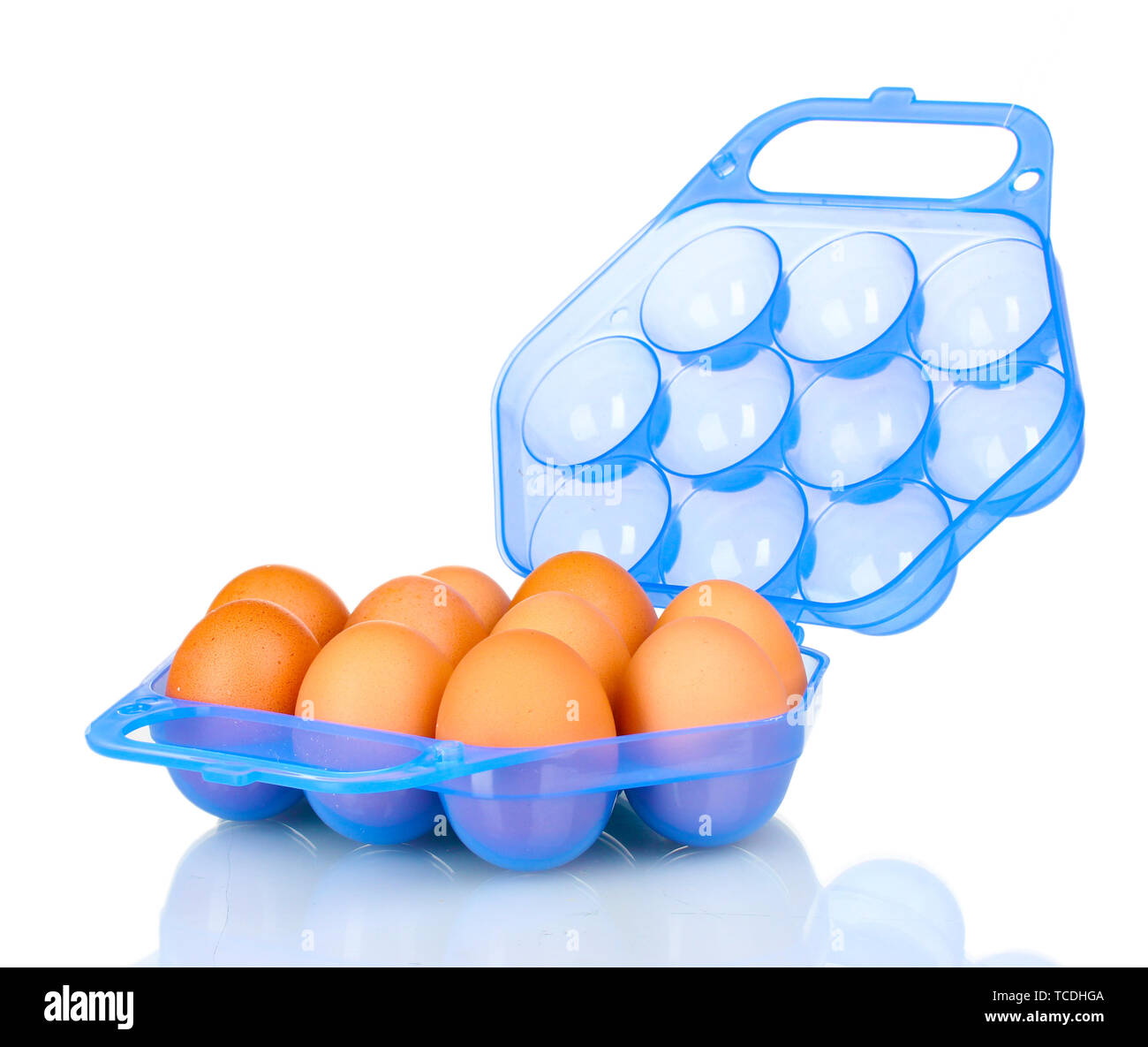 Eggs in blue plastic box isolated on white Stock Photo - Alamy