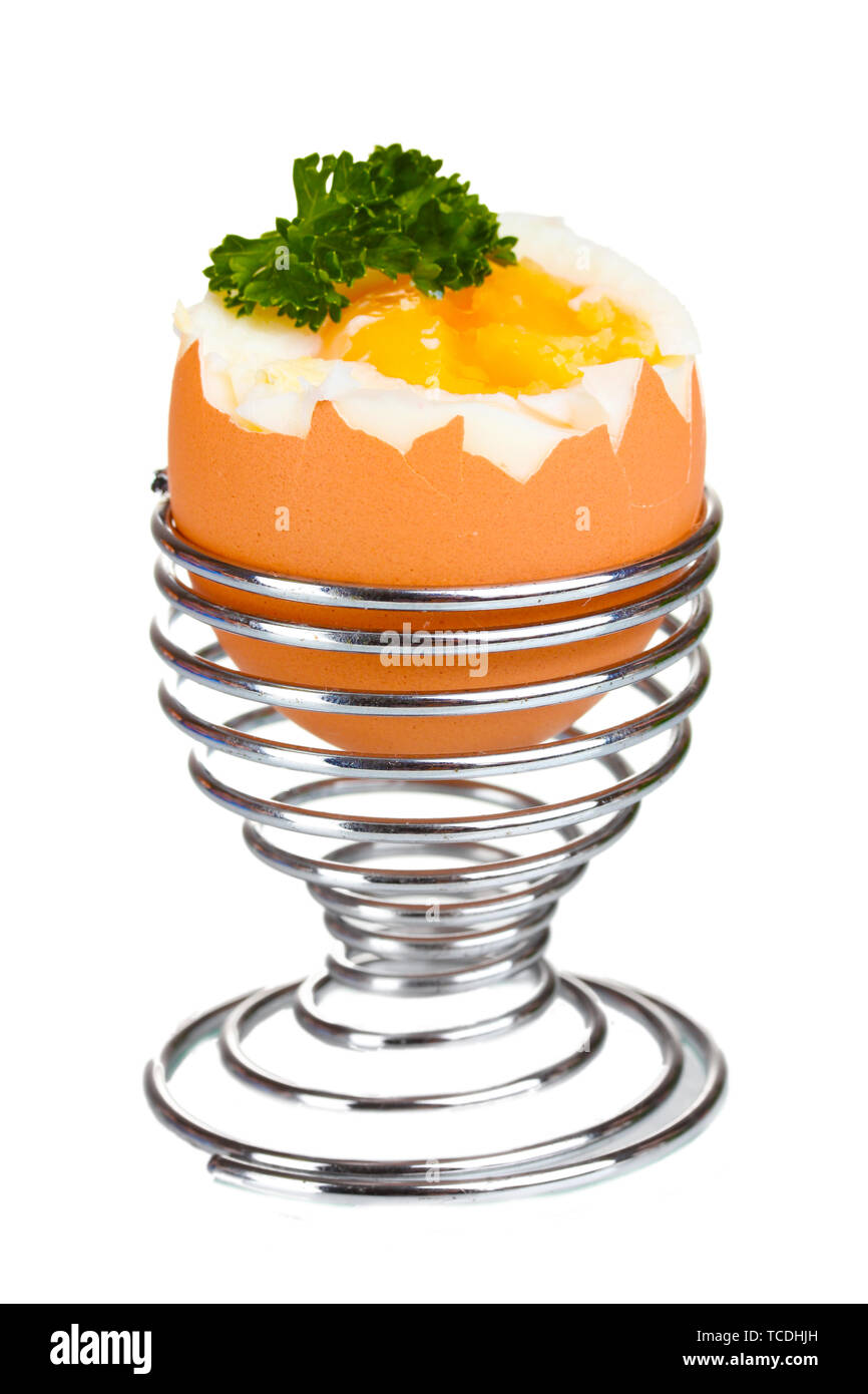 boiled egg in metal stand and parsley isolated on white Stock Photo - Alamy