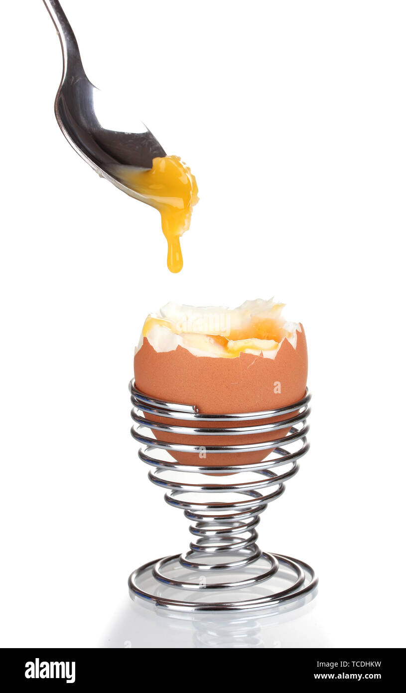 boiled egg in metal stand and spoon isolated on white Stock Photo - Alamy