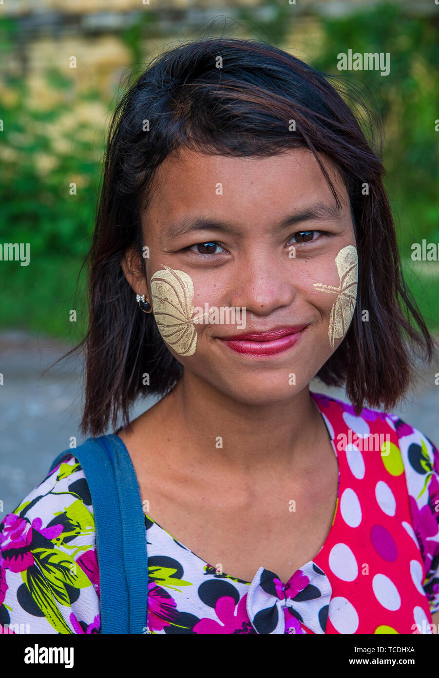 Portrait of Burmese girl with thanaka on face on Mandalay Myanmar Stock ...