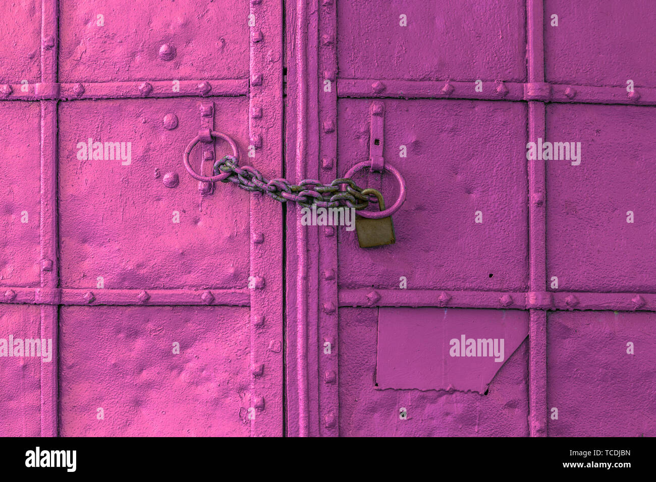 fresh painted old riveted door Stock Photo - Alamy