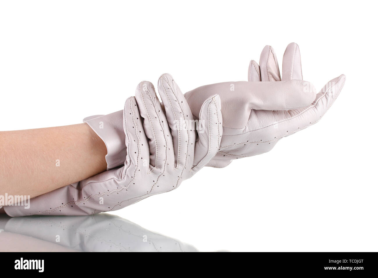 women's hands in gray leather gloves isolated on white Stock Photo - Alamy