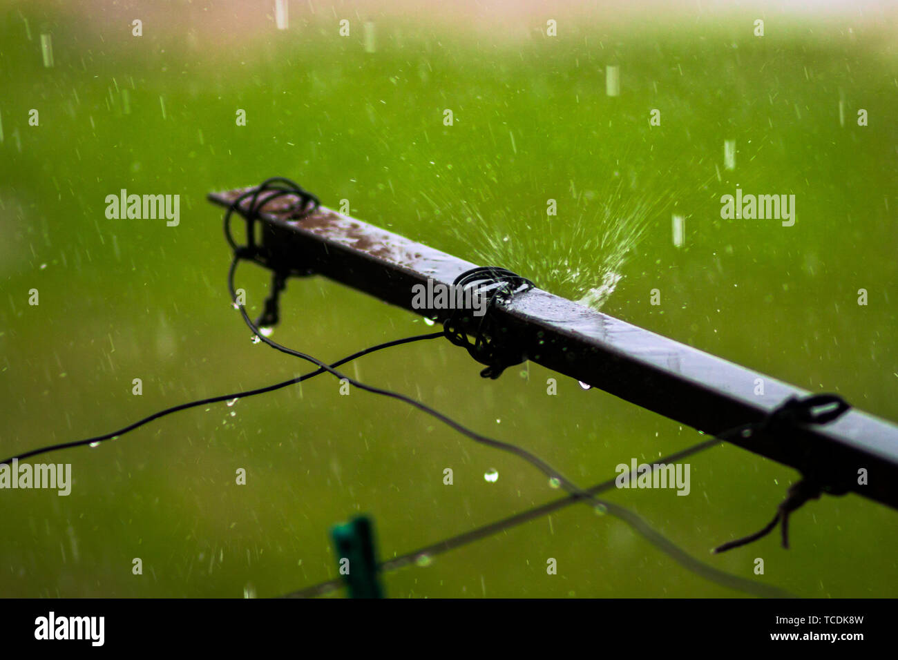 Old balcony clothes drying ropes guide at rainy day close up Stock ...