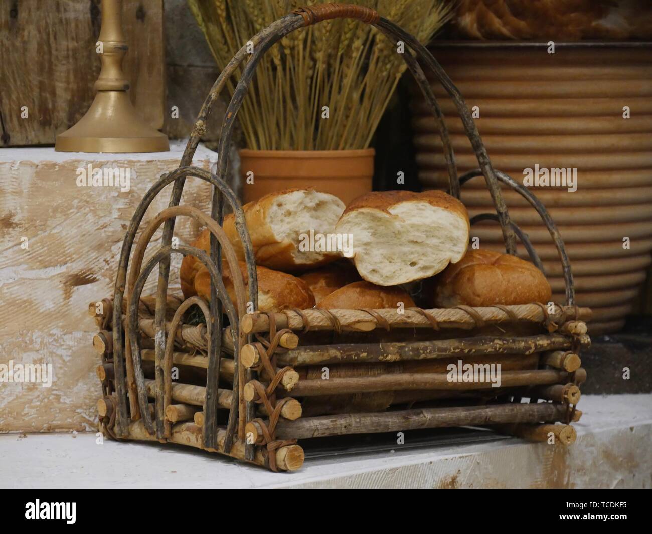 Wooden tray with loaves of bread in a stage set Stock Photo - Alamy