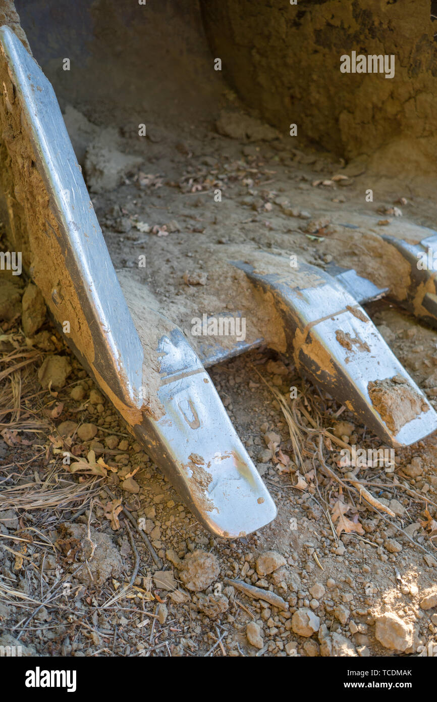 a large excavator digging bucket Stock Photo - Alamy