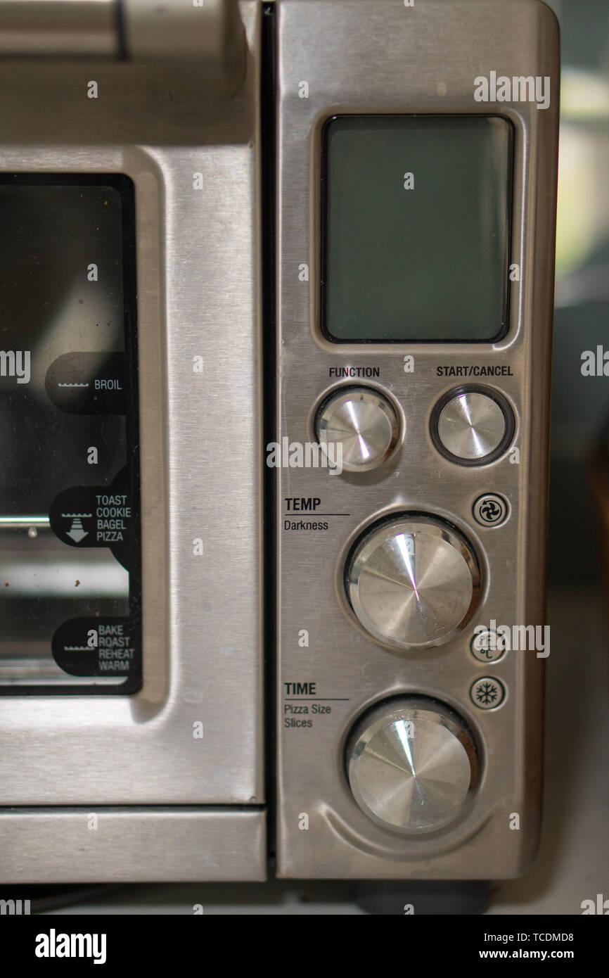 Stainless steel toaster oven controls Stock Photo - Alamy
