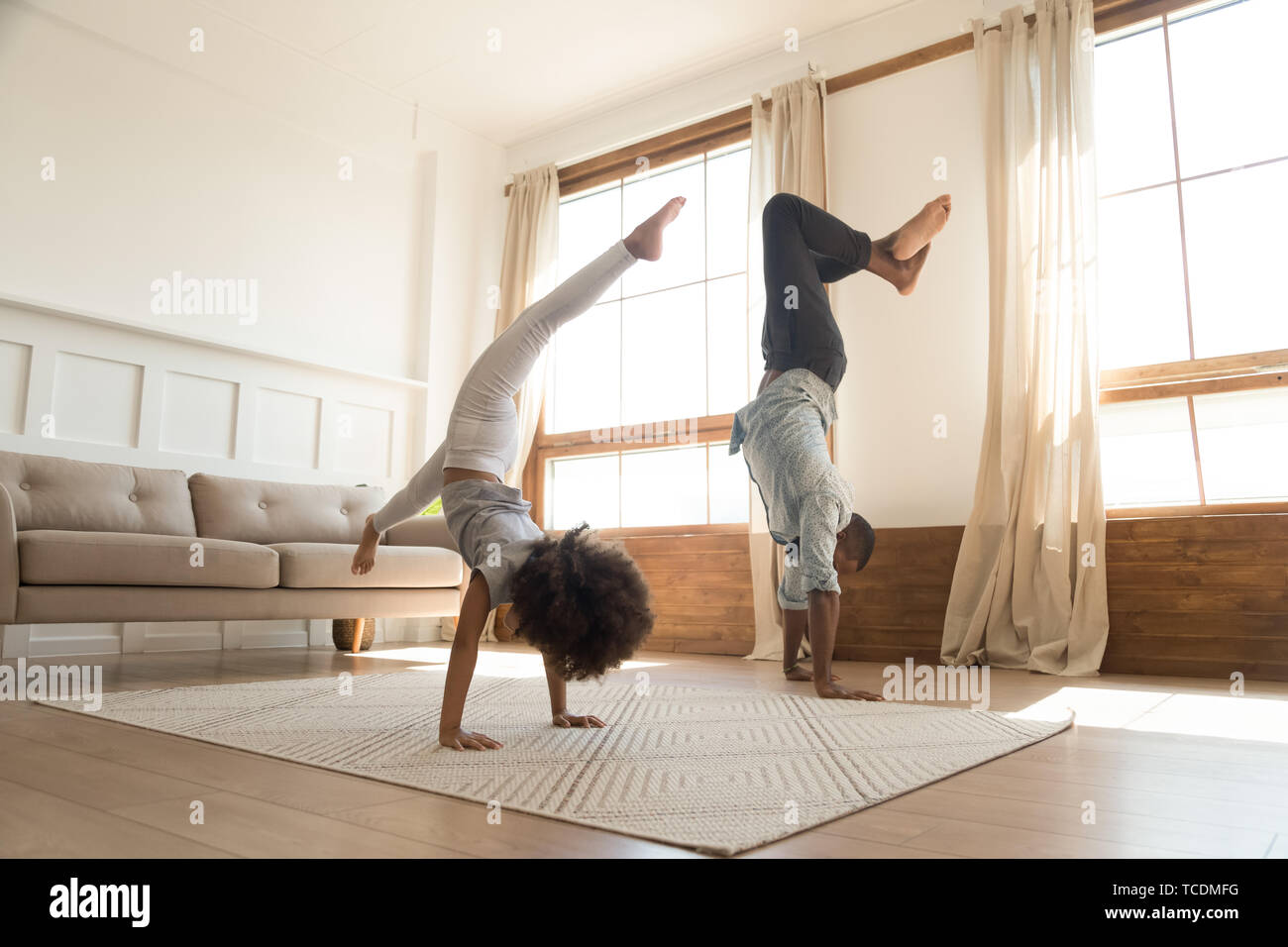 Girl doing handstand hi-res stock photography and images - Alamy