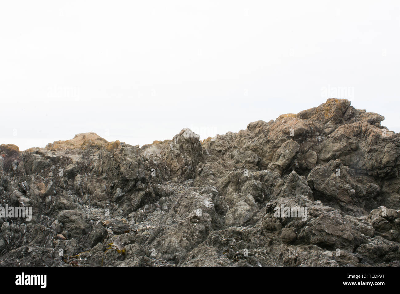 Beautiful view of amazing rocky hill on background of light sky Stock ...