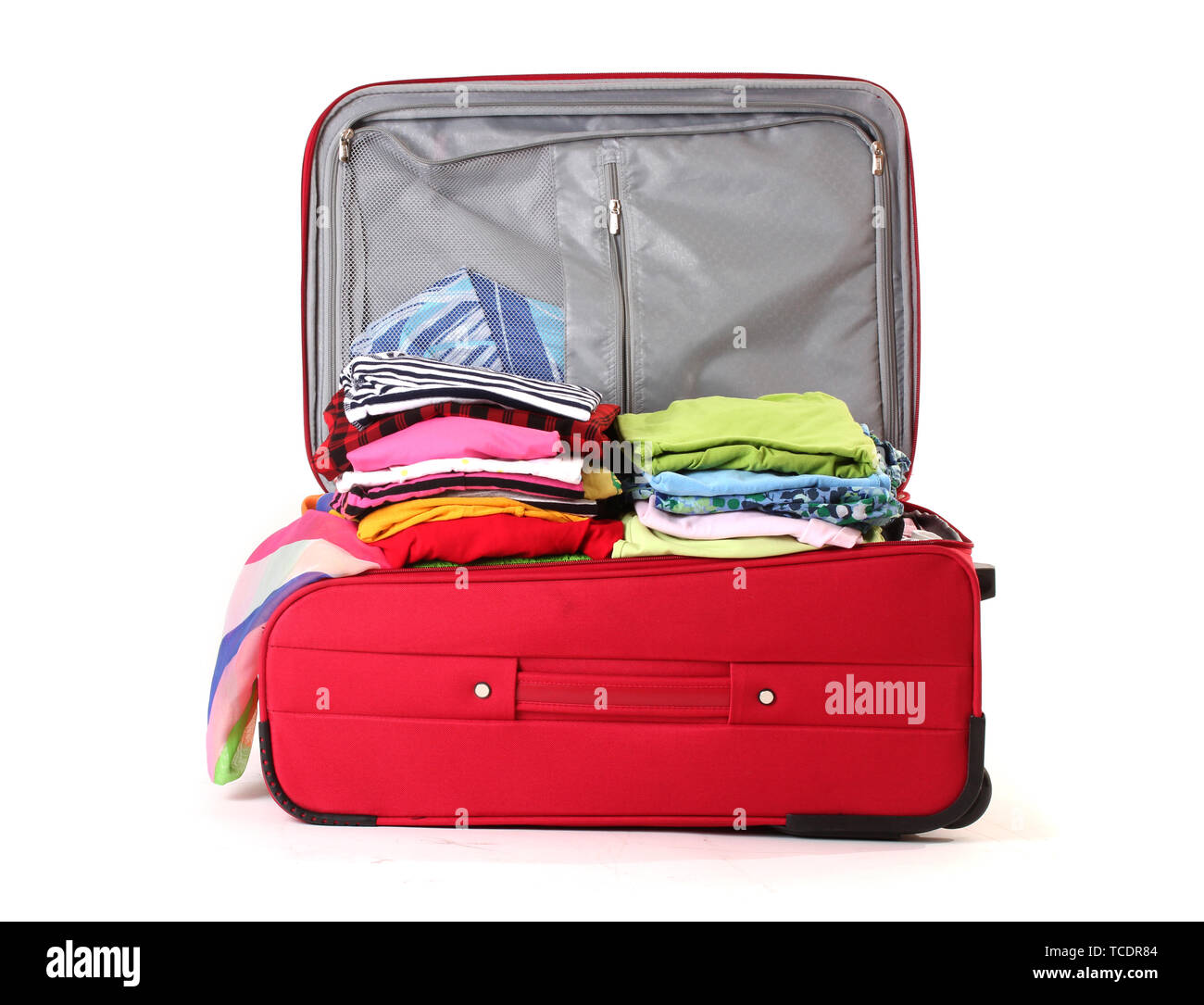 Open red suitcase with clothing isolated on a white Stock Photo - Alamy