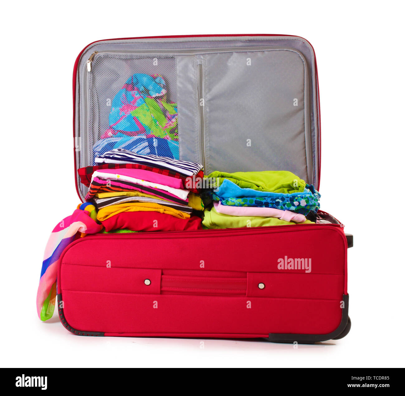 Open red suitcase with clothing isolated on a white Stock Photo - Alamy
