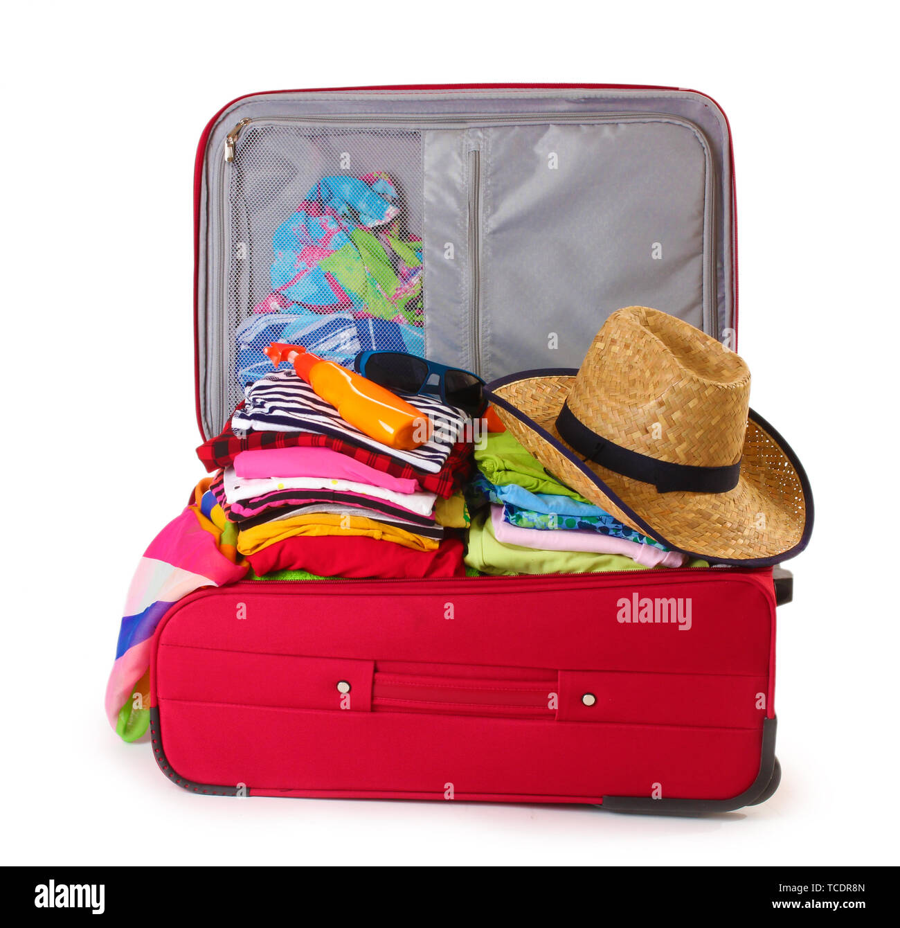 Open red suitcase with clothing isolated on a white Stock Photo - Alamy