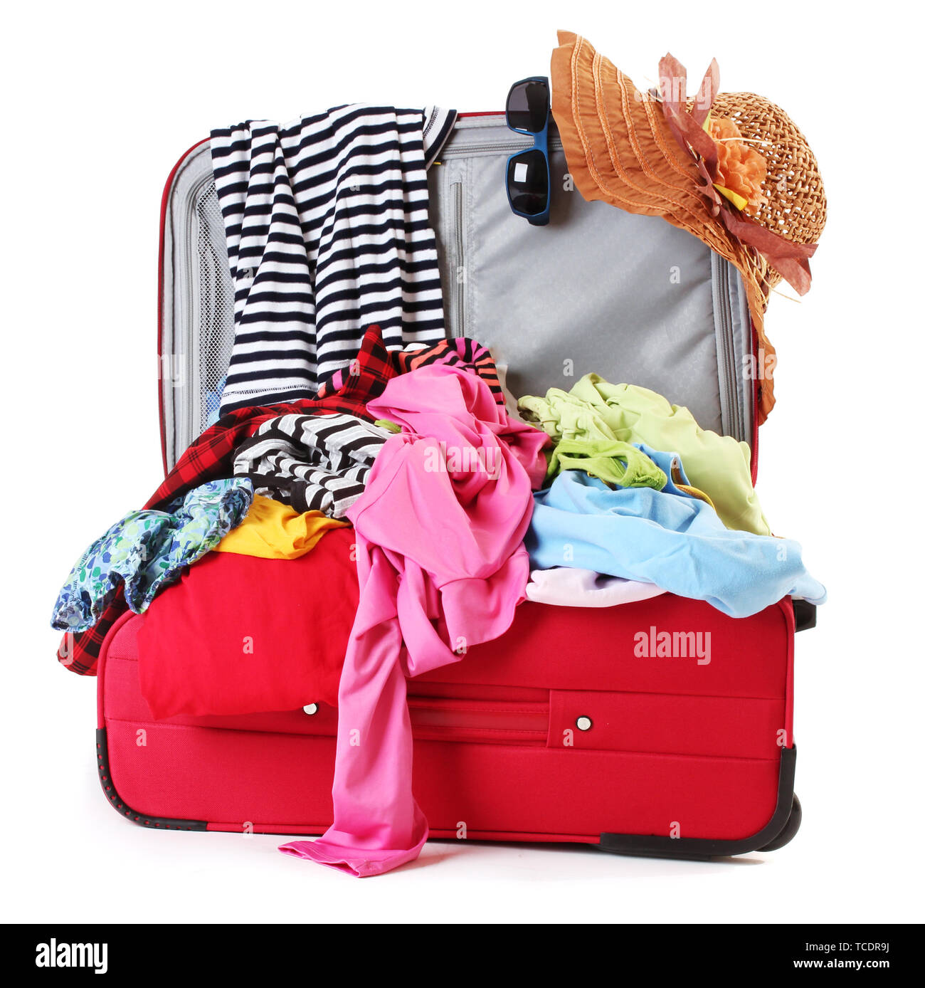Open red suitcase with clothing isolated on a white Stock Photo - Alamy