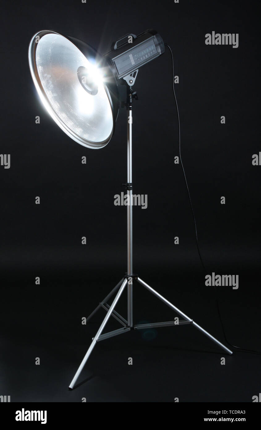 Studio flash with beauty dish on grey background Stock Photo - Alamy