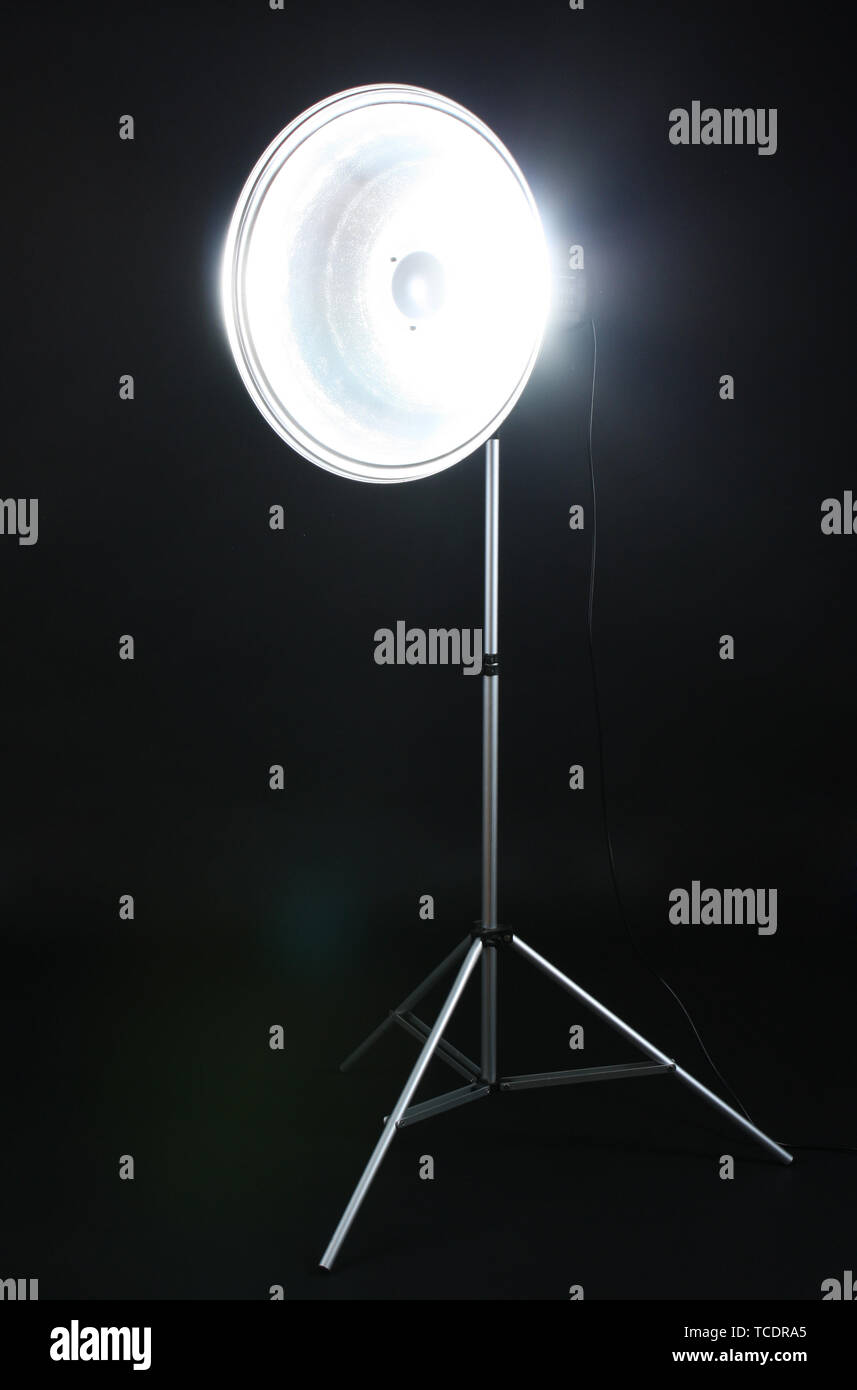 Studio flash with beauty dish on grey background Stock Photo - Alamy