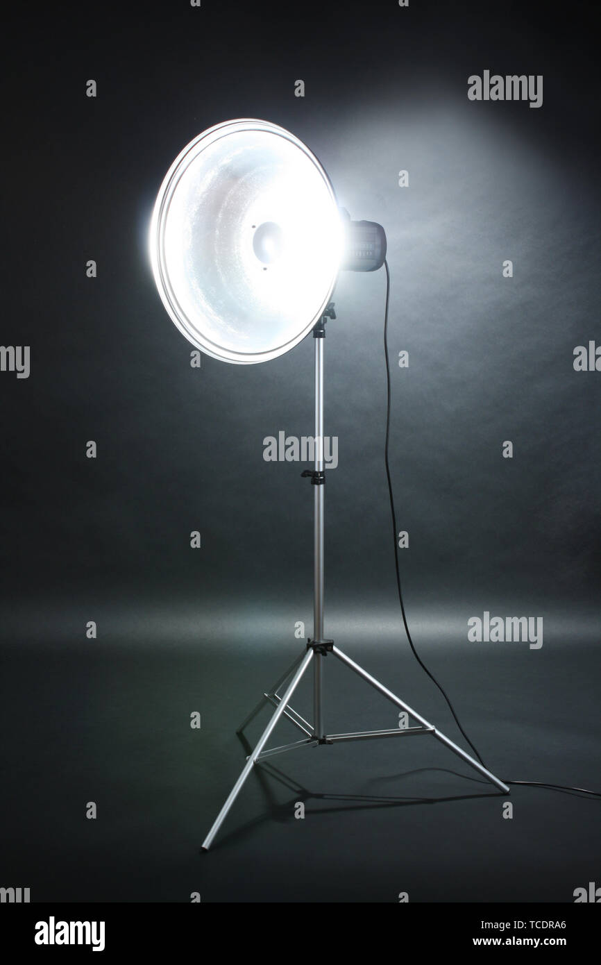 Studio flash with beauty dish on grey background Stock Photo - Alamy