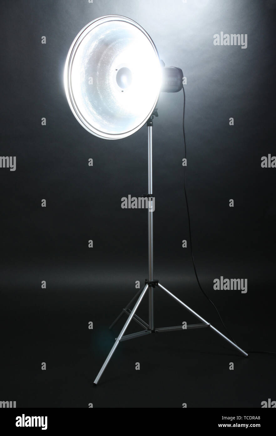 Studio flash with beauty dish on grey background Stock Photo - Alamy