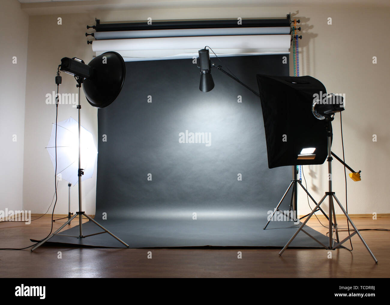 Studio flash on grey background Stock Photo - Alamy