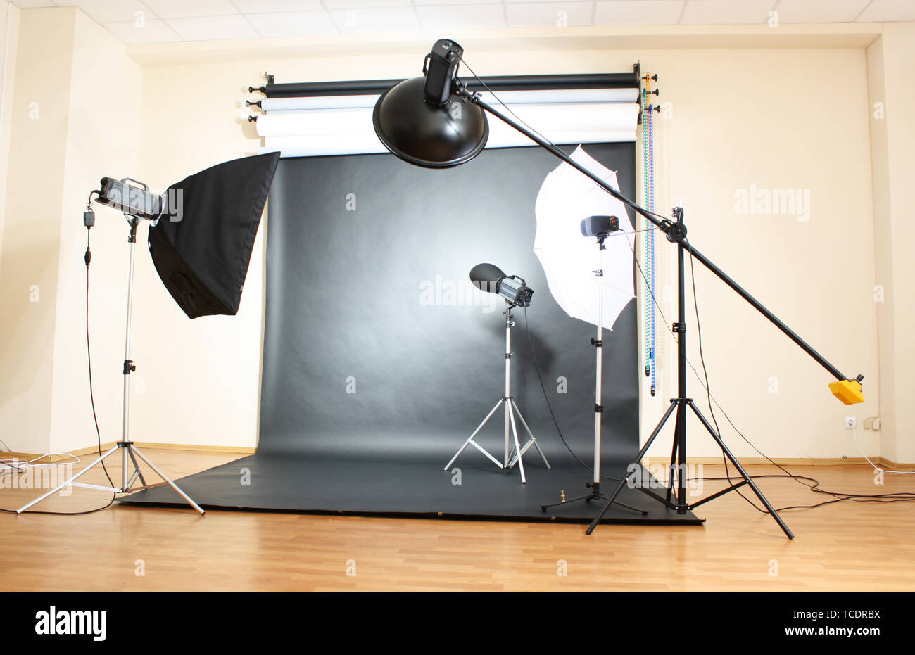 Studio flash on grey background Stock Photo - Alamy